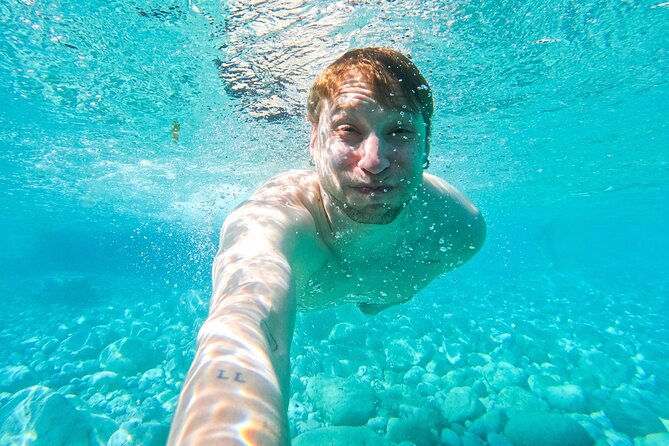 Kayak tour in Capri between caves and beaches. Photos included. - What Makes This Tour Stand Out?