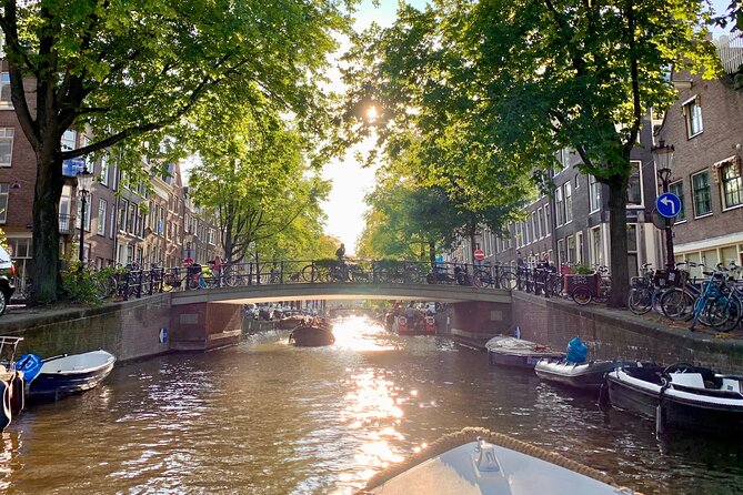 Amsterdam Canal Cruise with German Guide and unlimited drinks - Authentic Experiences and Practical Details