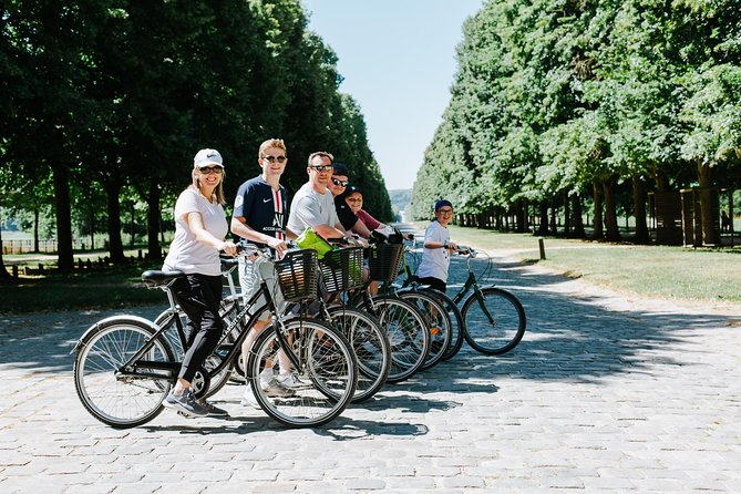 Versailles Domain Bike Tour with Palace Entry by Train from Paris