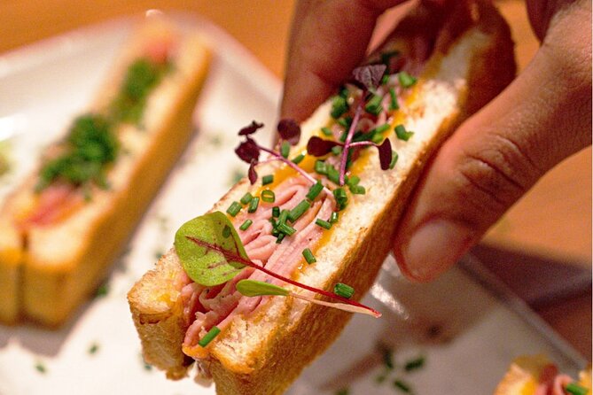 10+ tastings Gourmet Food & Wine Tour in the Heart of Paris - Stop 4: Ô Chateau – Wine Tasting and Historic French Fare