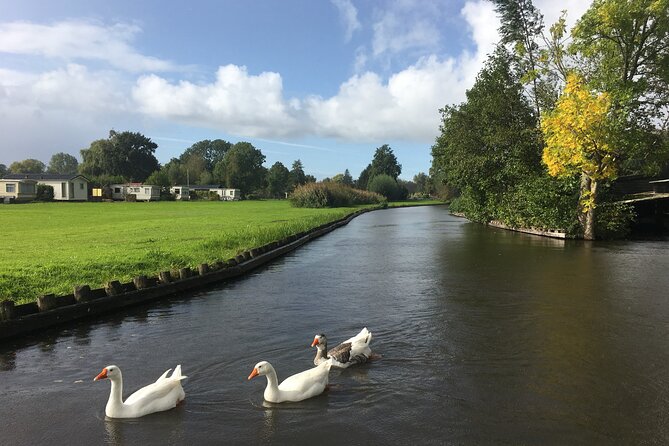 Giethoorn and Zaanse Schans Day Tour Small Group Incl. Boat Ride - Exploring Zaanse Schans: Windmills, Cheese, and Wooden Shoes