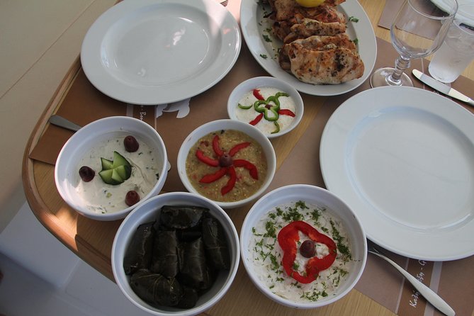 Santorini Luxury Sailing Catamaran Cruise with BBQ, Drinks and Transfer - The Experience in Detail