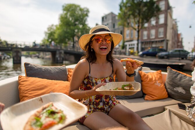 Amsterdam Private Boat Trip with Pizza and Unlimited Drinks - An Overview of the Experience