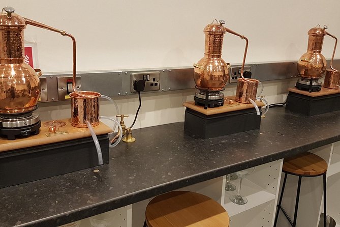 Distill a bottle of gin on mini copper stills - An In-Depth Look at the Gin Distilling Workshop