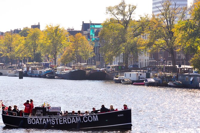 Open Boat Canal Cruise in Old City Centre of Amsterdam - An Authentic Waterway Experience in the Heart of Amsterdam