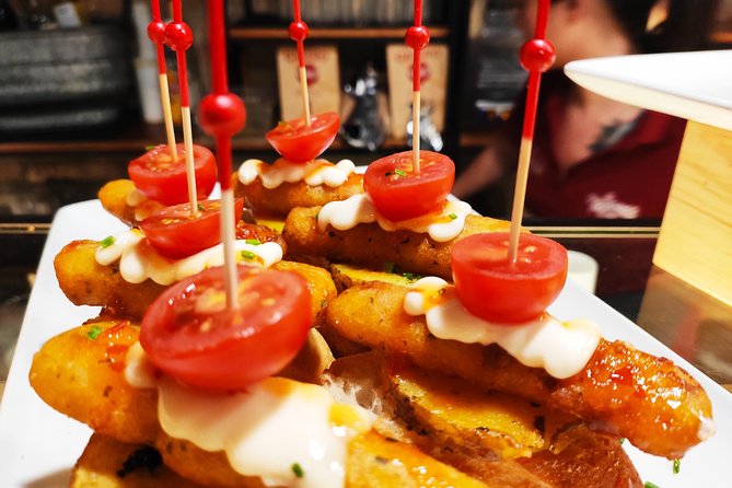 Spanish Wine and Tapas tour in a local Neighborhood in Barcelona - Exploring the Itinerary: What to Expect From Each Stop