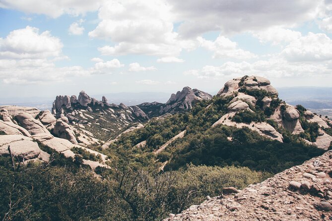 Montserrat Mountain Hiking Tour to Sant Jeroni, Small Group - Authentic Experiences and Traveler Highlights