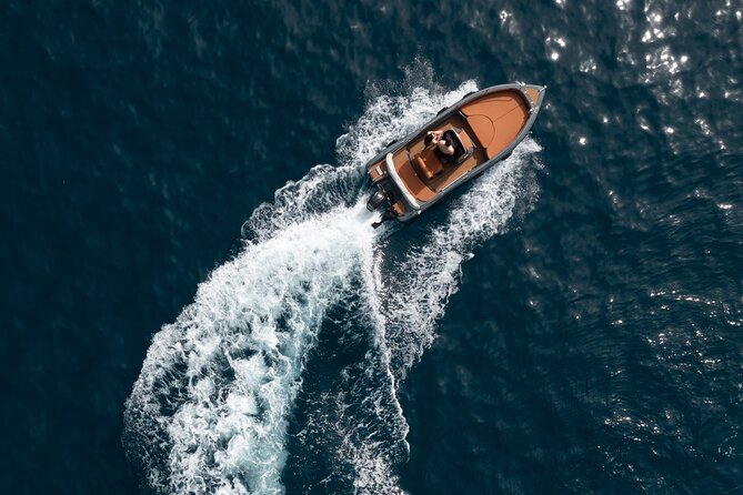 Ranieri Soverato Boat Rental in Santorini -License free- Be a Captain for a day - The Sum Up