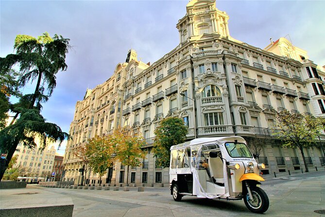 Tour of Historic and Modern Madrid with a guide in a yellow tuk tuk - The Experience on the Road