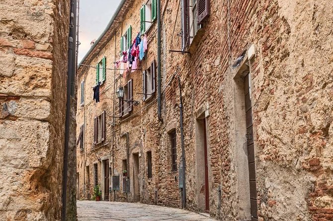 Tuscany countryside from Livorno: Private Volterra, San Gimignano & Wine Tasting