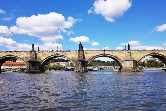 2:5-Hour Walking Tour of Old Town Prague with Boat Ride - Crossing the Iconic Charles Bridge