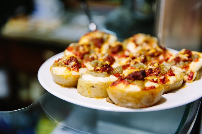 Barcelona Night Bike Tour with Local Tapas and Cava Stop - Who Should Book This Tour?