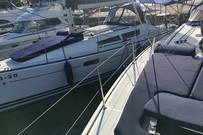 Barcelona Sunset Sailing with Open Bar of Cava and Snacks - The Sum Up: The Best of Barcelona from the Water