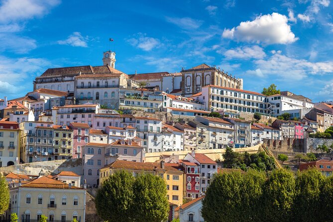 Transfer Tour Porto/Lisbon with 2 stops options Óbidos, Nazaré, Fátima, Coimbra - The Stops and What to Expect