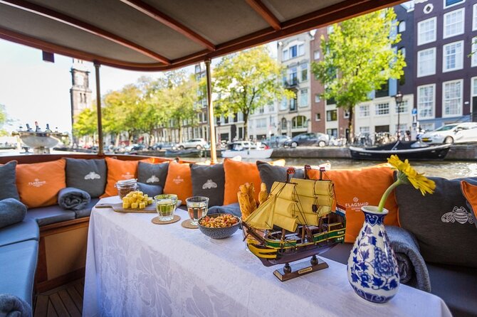 Amsterdam Small-Group Bike Tour With Canal Cruise, Drinks, Cheese - Authenticity, Challenges, and Tips