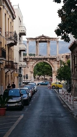 Acropolis monuments, Parthenon and Plaka, Monastiraki walking tour - Return through UNESCO-Listed Streets and the Roman Agora