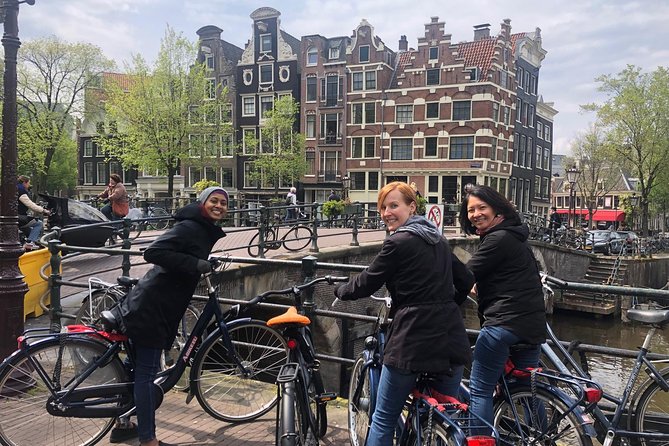 Private Amsterdam Bike Tour with a local guide (also for families) - The Sum Up