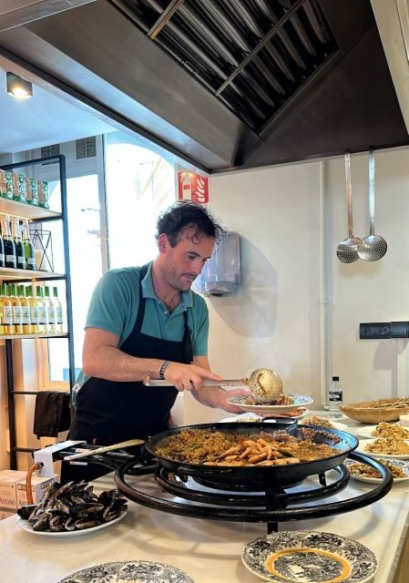 Seville: Paella-Cooking Experience with Sangria & Full Meal