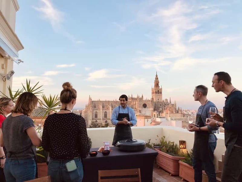 Seville: Private Paella Cooking Class with Cathedral Views