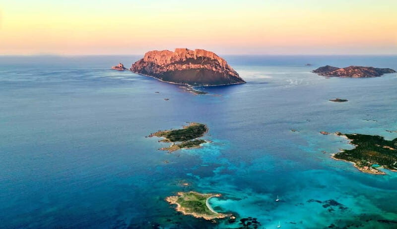 Tavolara: Sunset Aperitif Tour with Drinks and local snacks - The Itinerary in Detail: From Start to Sunset