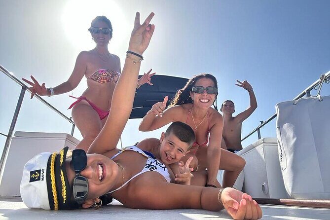 Discovering Cefalù's Coastline Activity on a Mini Catamaran