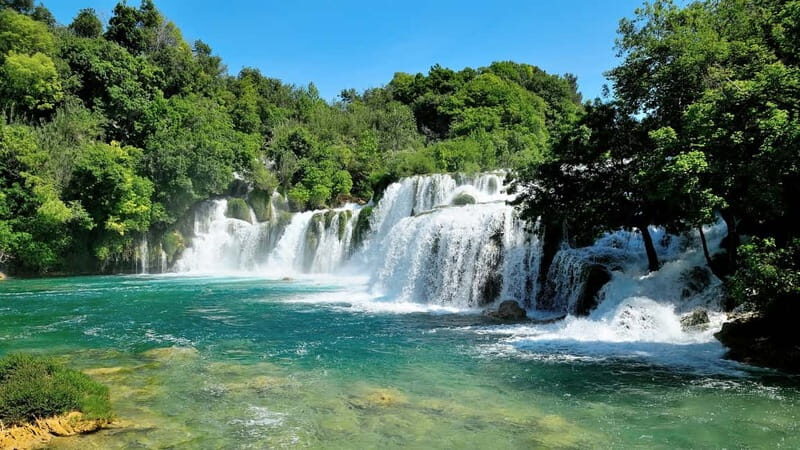 From Split: Krka Waterfalls with Riverboat Ride & swimm stop - What Makes This Tour Stand Out?