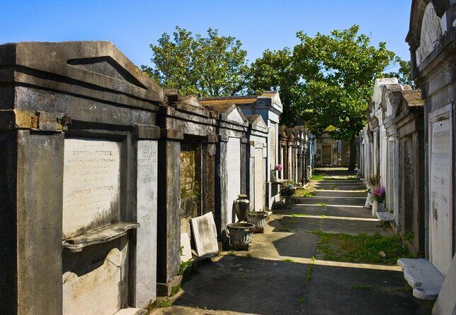 Garden District Celebrities Cemeteries Mansions and Mysteries Walking Tour - Exploring the Land of the Dead and Mysterious Mansions