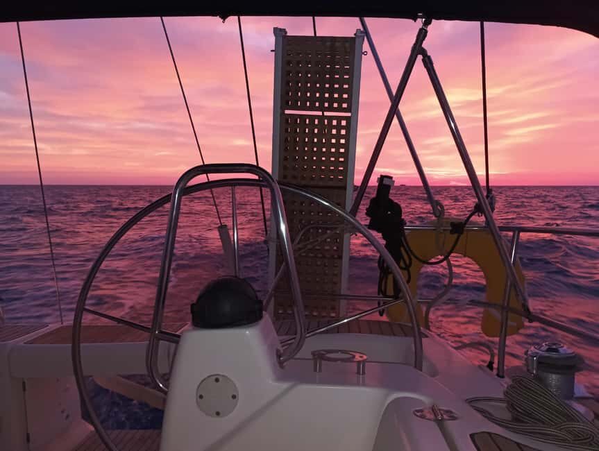 Romantic Sunset Cruise in Kissamos: Music, Wine, Giving Back