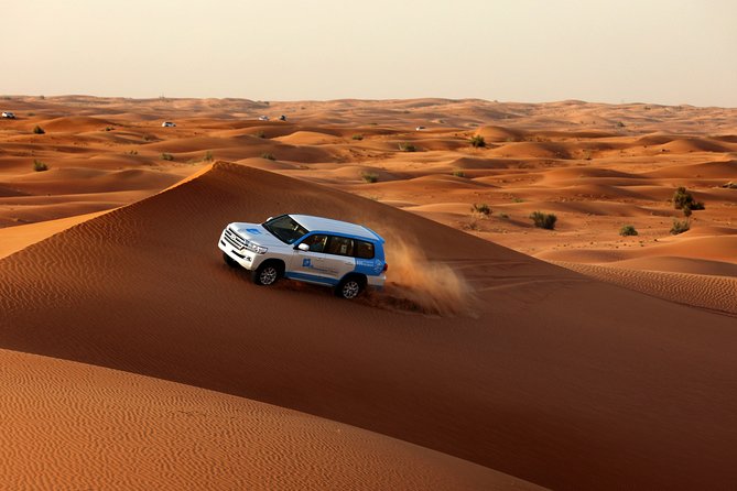 Dubai Overnight Desert Safari, BBQ & Stargazing at Al Khayma Camp - Dune Bashing and Sandboarding: The Heart-Pumping Activities