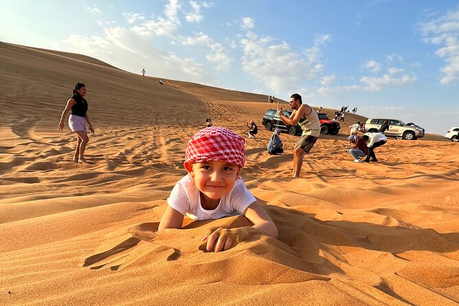 Dubai: Red Dunes, Sandsurf, Camel Ride, BBQ Dinner at Desert Camp - An In-Depth Look at the Tour Experience