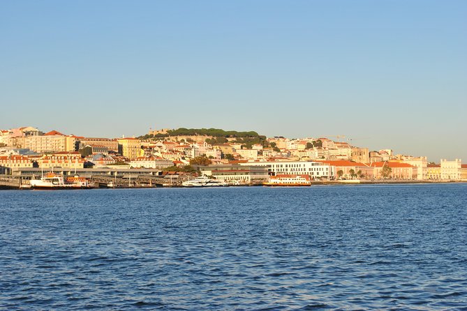 Lisbon Old town Sailng Cruise with a drink- 2h Small Group Tour
