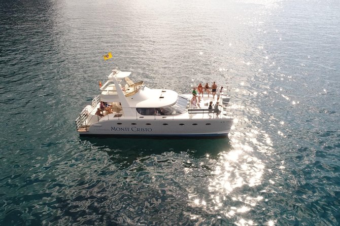 Private Catamaran Charter with Transfer, Buffet and Snorkeling