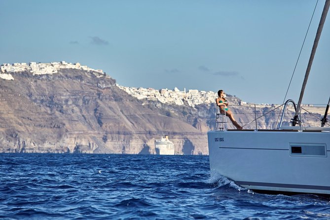 Santorini Luxury Sailing Catamaran Cruise with BBQ, Drinks and Transfer