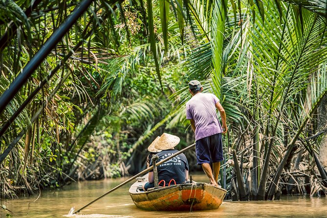 Small group mekong delta day trip: boat ride, cottages & pagoda the village and canals