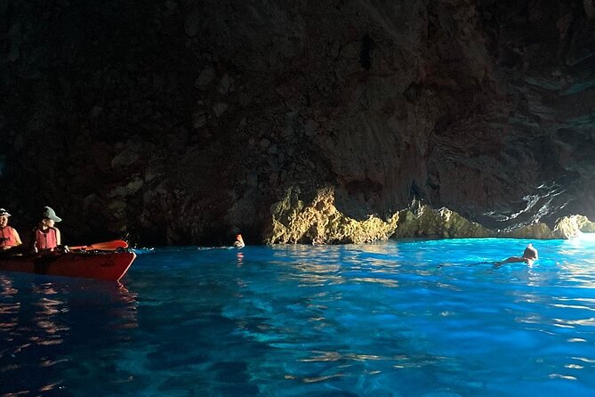 Kayak Trip to Hidden blue Cave, with lunch & fruits. - The Sum Up