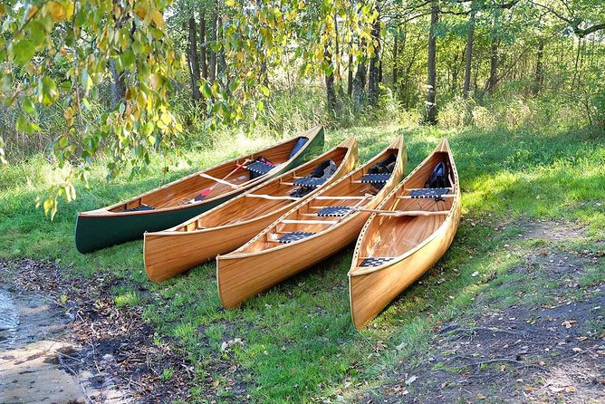 Premium guided Canoe Tour in lake Plateliai Handcrafted inventory and picnic set