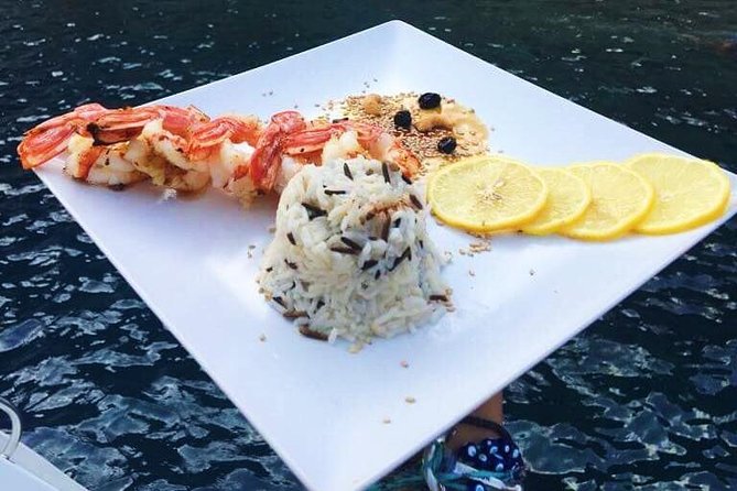 Santorini Luxury Catamaran Sunset Cruise with BBQ, Drink and Transfer