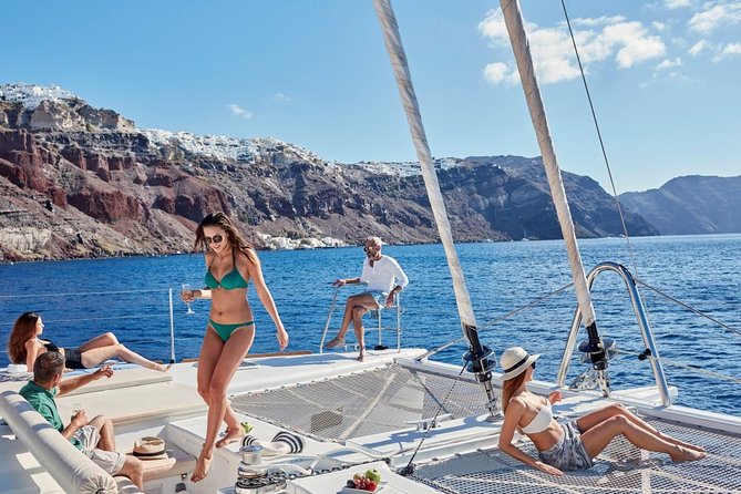 Santorini Sunset Luxury Sailing Catamaran Cruise with BBQ, drinks, transfer