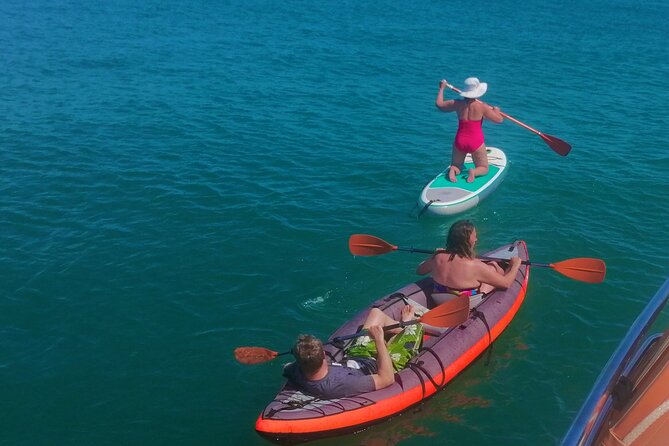 Full day private yacht from lagos with drinks, tapas, paddle boards and kayak - The Sum Up