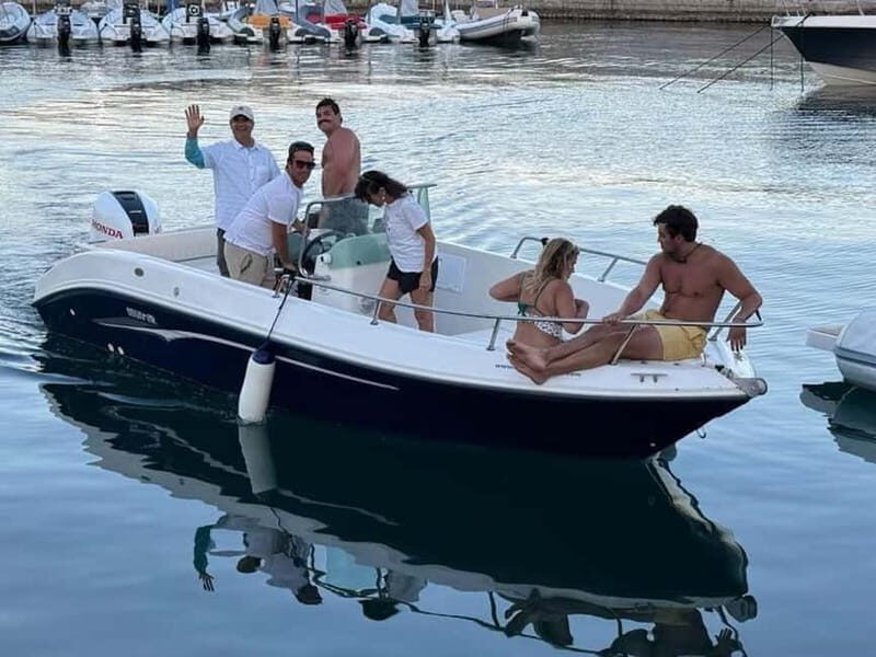 Aperitif on a boat at sunset at the Queen Cave