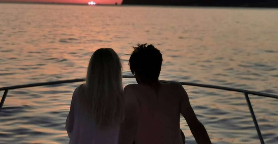 Fira: Private Sunset Cruise with BBQ, Drinks and Hot Springs