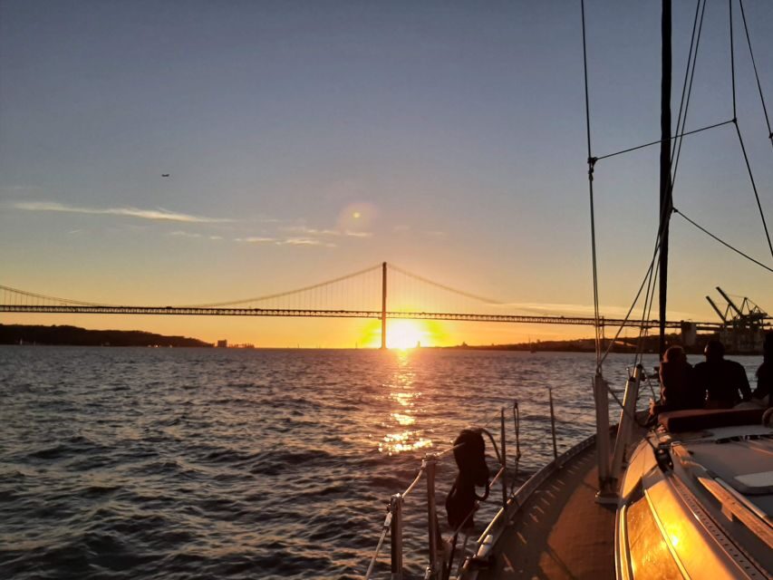 Lisbon: City Skyline Sailboat Cruise with Drink and Snacks