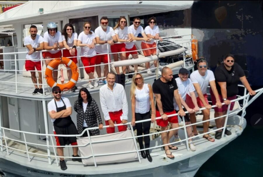 Rhodes: Bay to Bay Swim Cruise with Greek Buffet and Wine