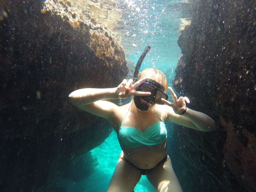 Rhodes: Beach Cruise with Swimming, Meal, & Unlimited Drinks