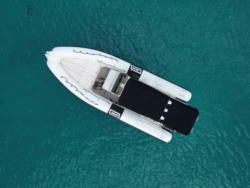 San Antonio: Private Boat Experience with Paddle Surfing and Snorkeling