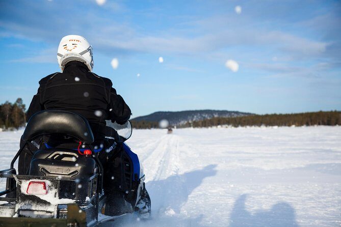 Snowmobile Safari to Lake Inari, meet & feed Reindeers, Lunch