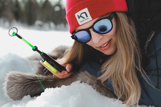 Lappish Lunch Break -Snowmobiling, ice fishing and tasty food