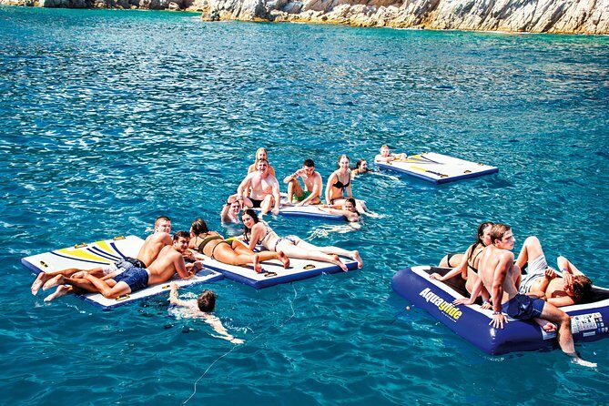 Special tour for groups sailing along the Costa Brava in a big catamaran. Food and drinks included. - Overview of the Experience