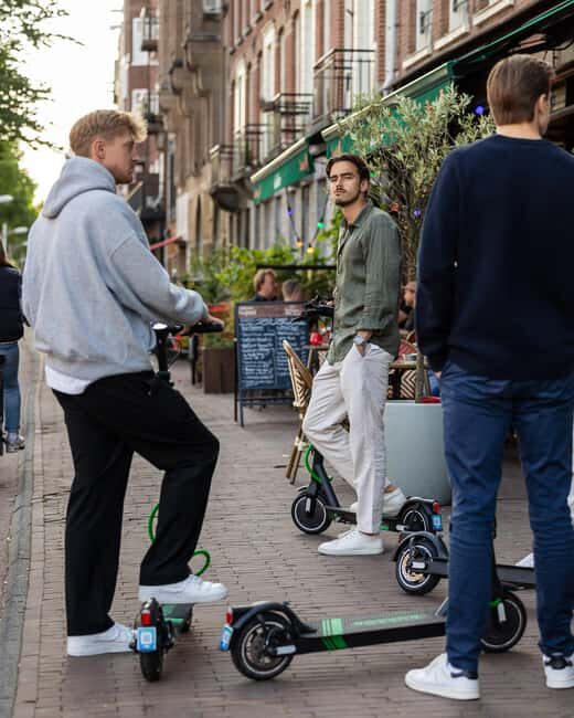 Amsterdam: E-Scooter Tour Golden Canals Tour (2h) - Who is this tour best for?