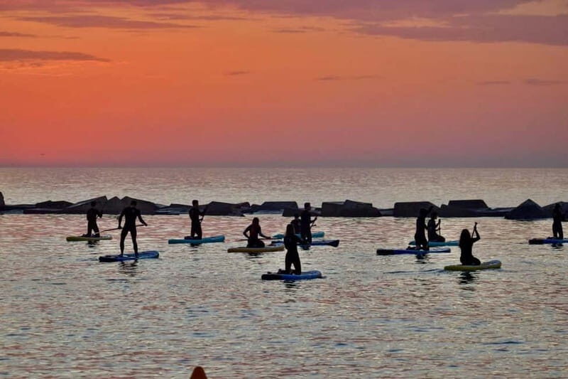 Barcelona: Paddleboarding at Sunrise. Includes: instructor, photos, equipment